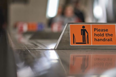 Enhanced Escalator Handrail Cleaning By An EHS Specialist